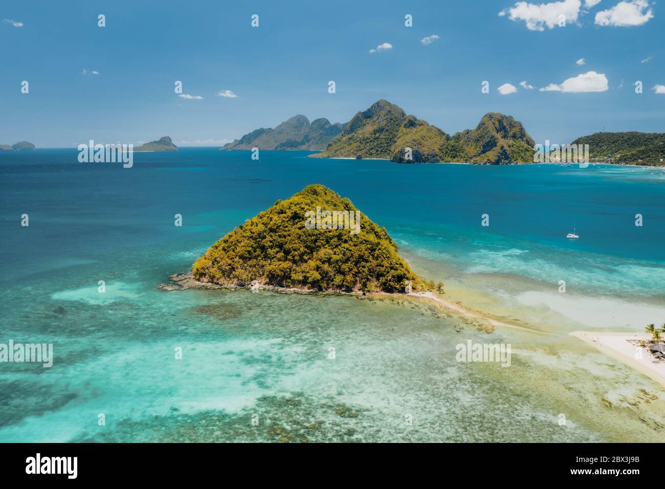 Aerial drone view of Las Cabanas beach in El Nido, Palawan Stock Photo ...