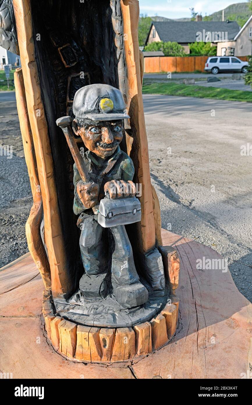 Wooden sculpture of a miner at the entrance to the Bellevue Underground ...