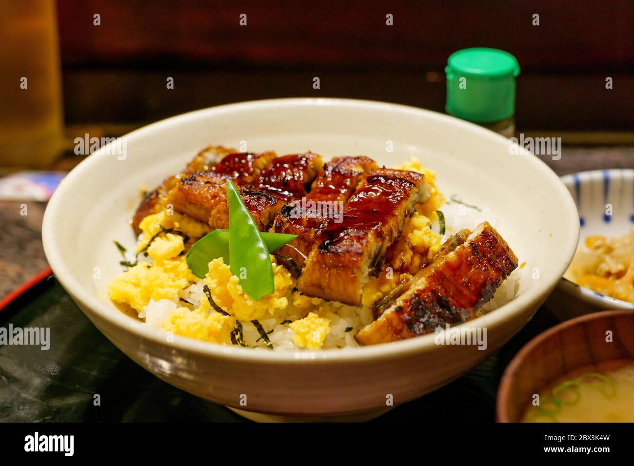 Unagi Don, Japanese grilled eel with teriyaki sauce serve with rice, simmer egg and Miso soup ...
