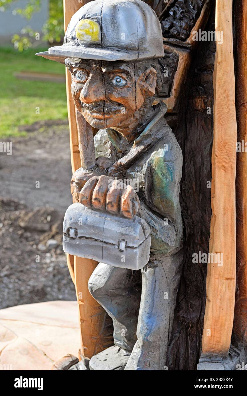 Wooden sculpture of a miner at the entrance to the Bellevue Underground ...