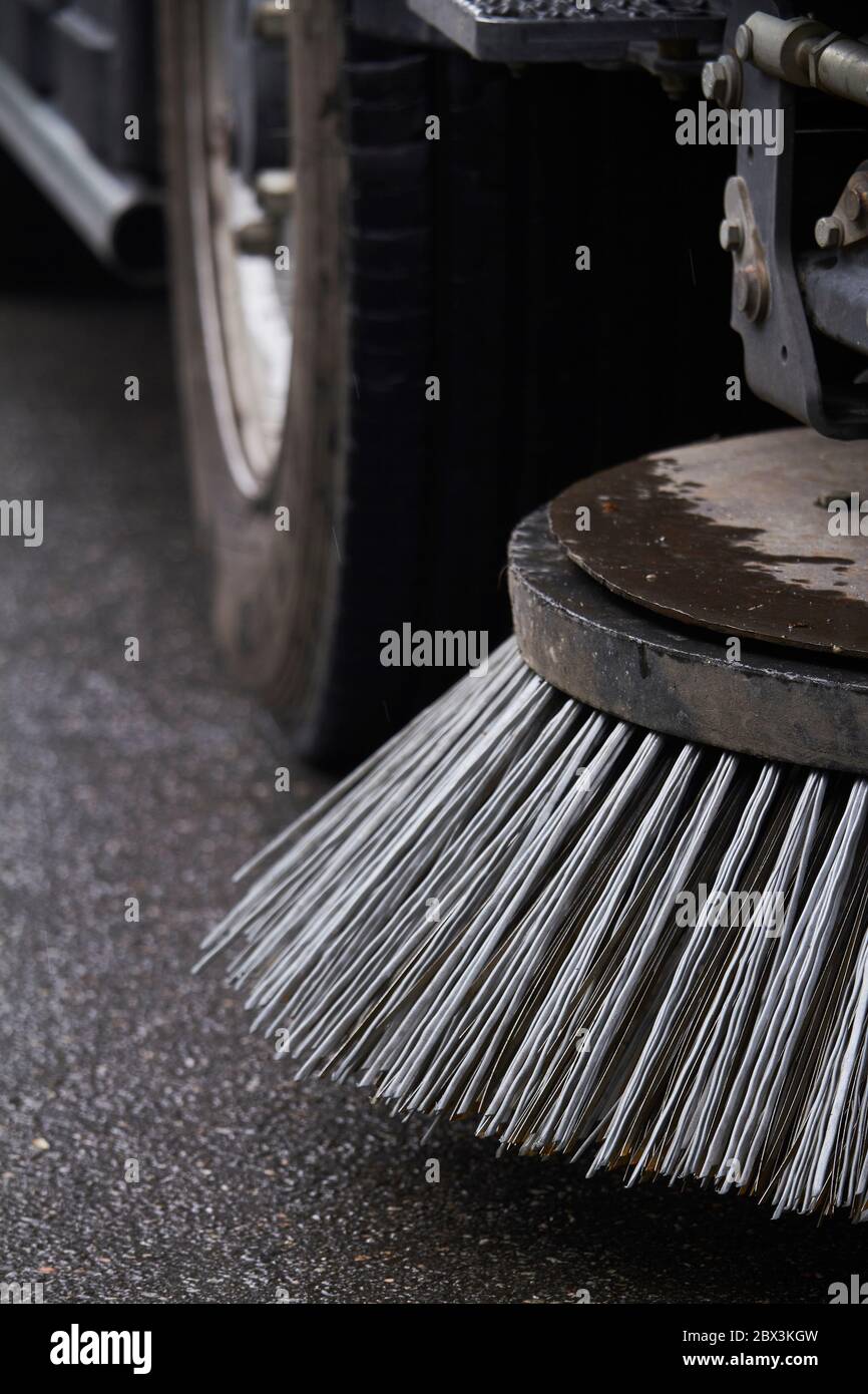 Close-up sweeper machine cleaning. Concept clean streets from debris ...