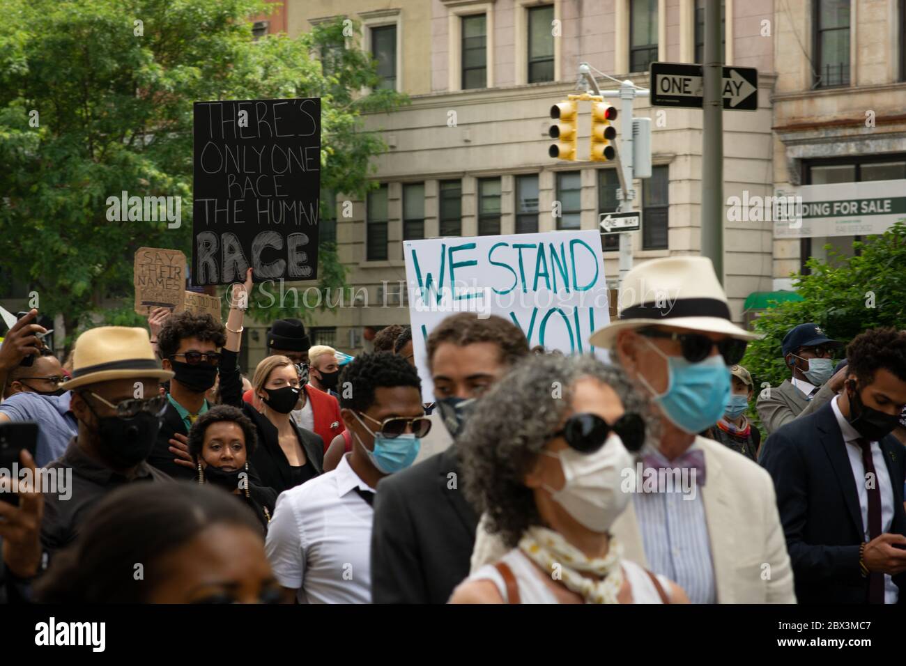 Marchers holding american flags hi-res stock photography and images - Alamy