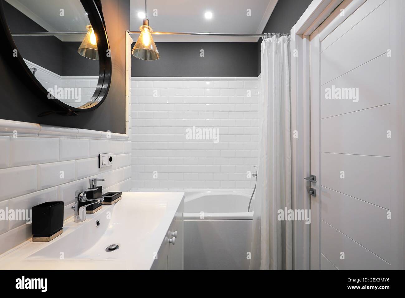 Modern bathroom interior in white color Stock Photo - Alamy