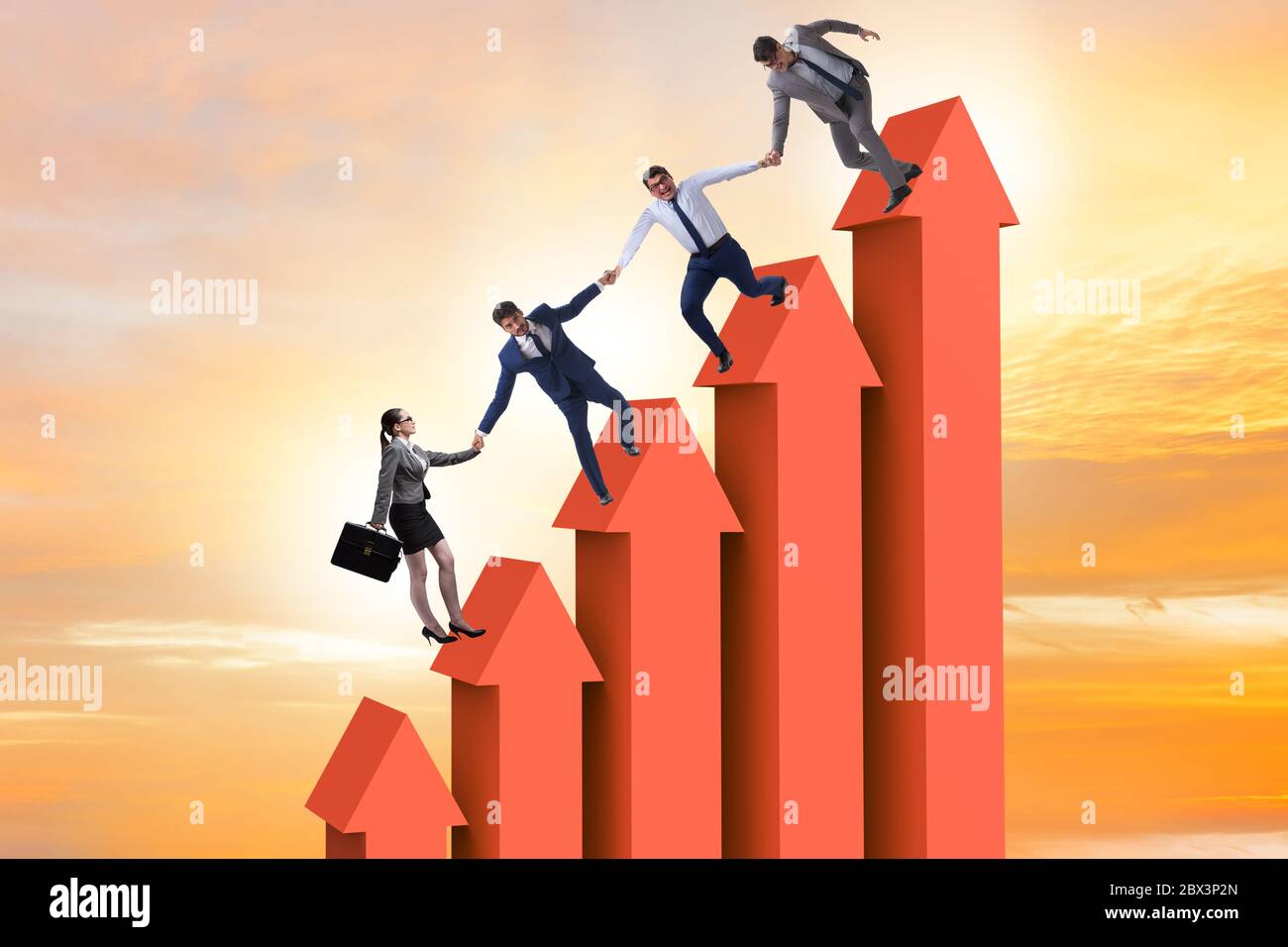 Colleagues helping each other to improve the results Stock Photo - Alamy