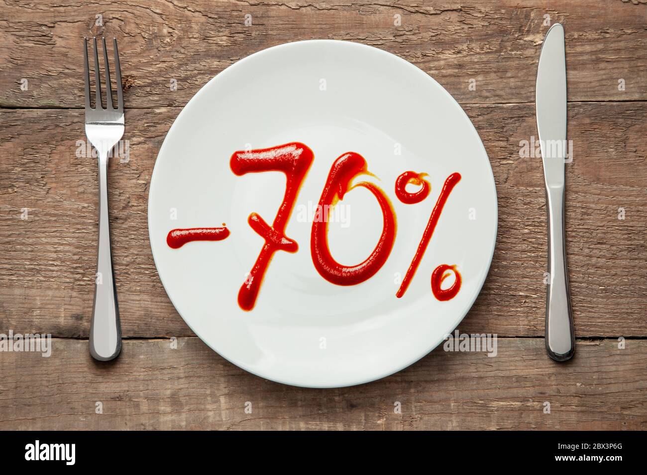 A knife sitting on top of a wooden tableundefined Stock Photo - Alamy