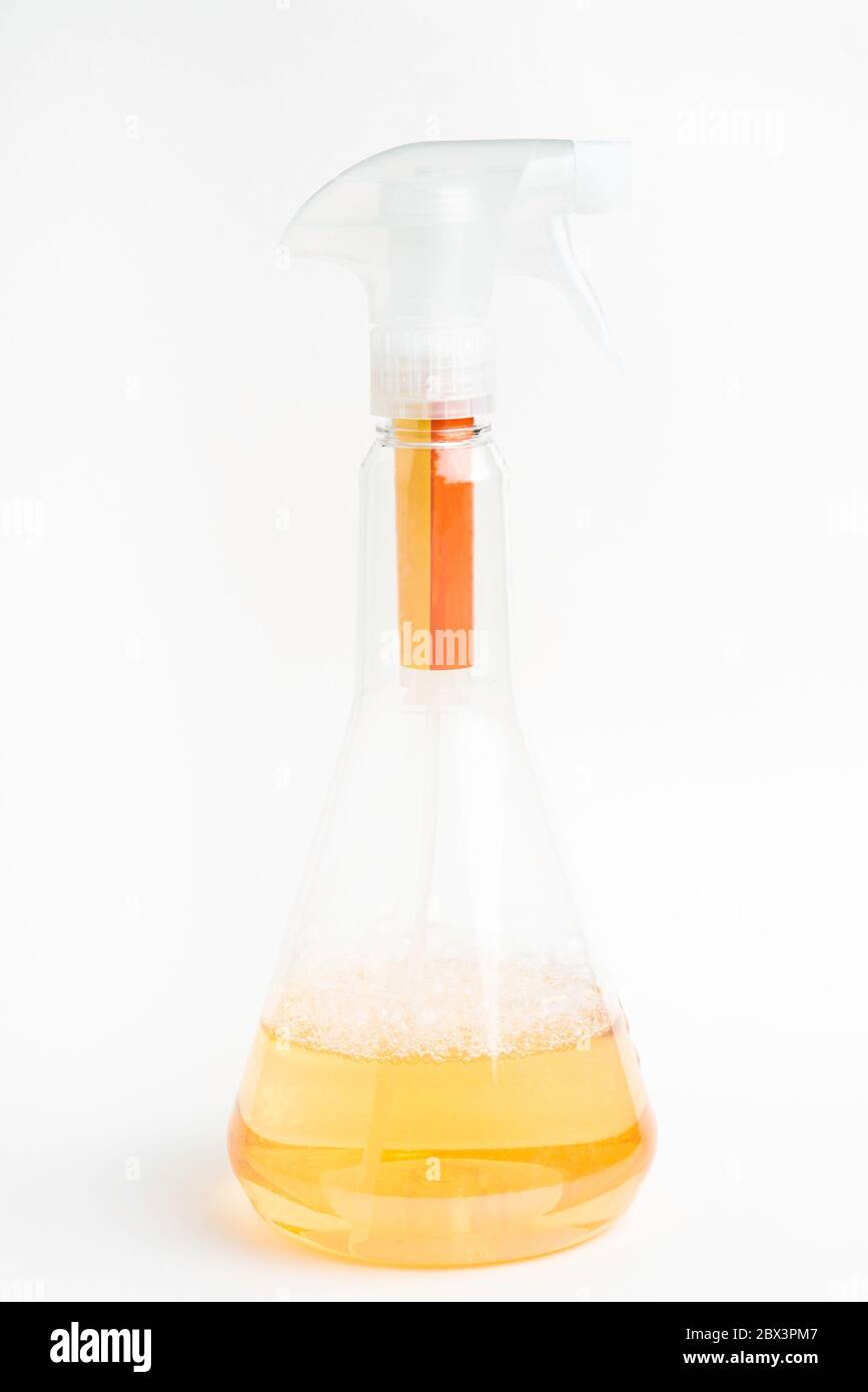 A product shot of the entire transparent liquid spray plastic dispenser ...