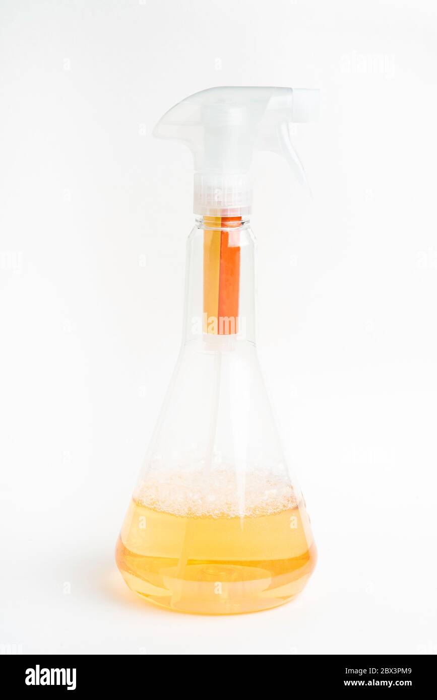 A product shot of the entire transparent liquid spray plastic dispenser ...