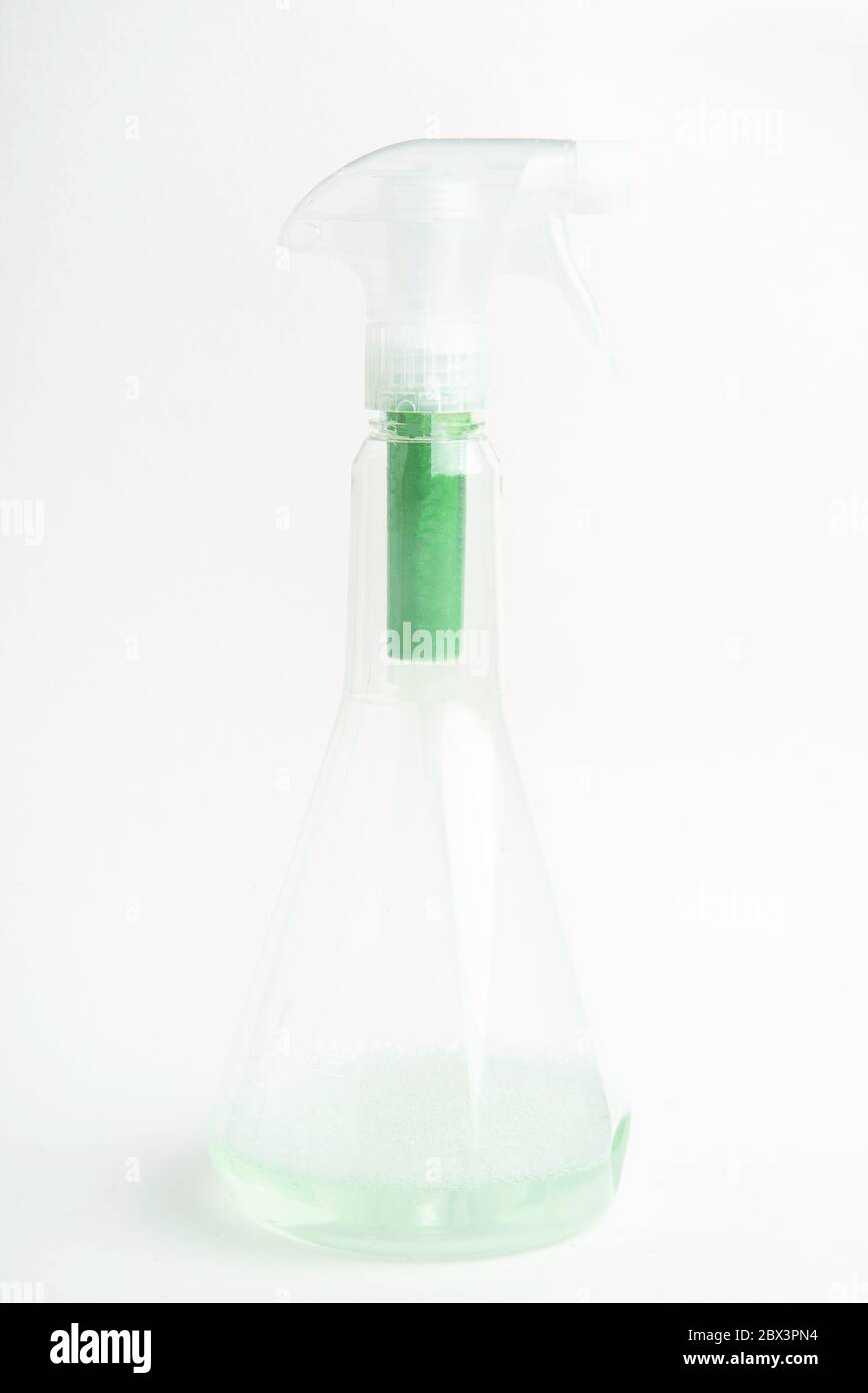 A product shot of the entire transparent liquid spray plastic dispenser ...