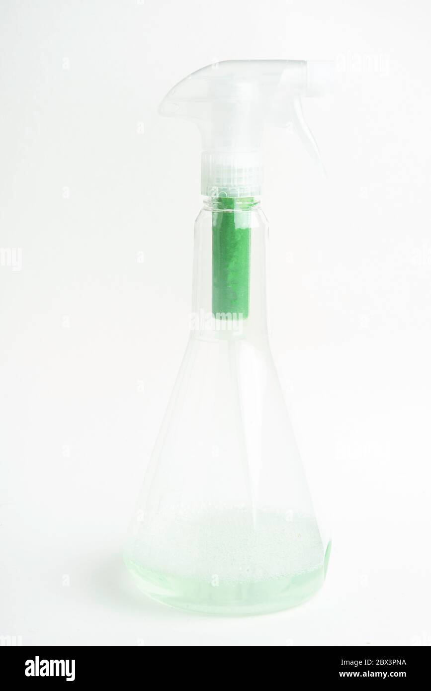 A product shot of the entire transparent liquid spray plastic dispenser ...