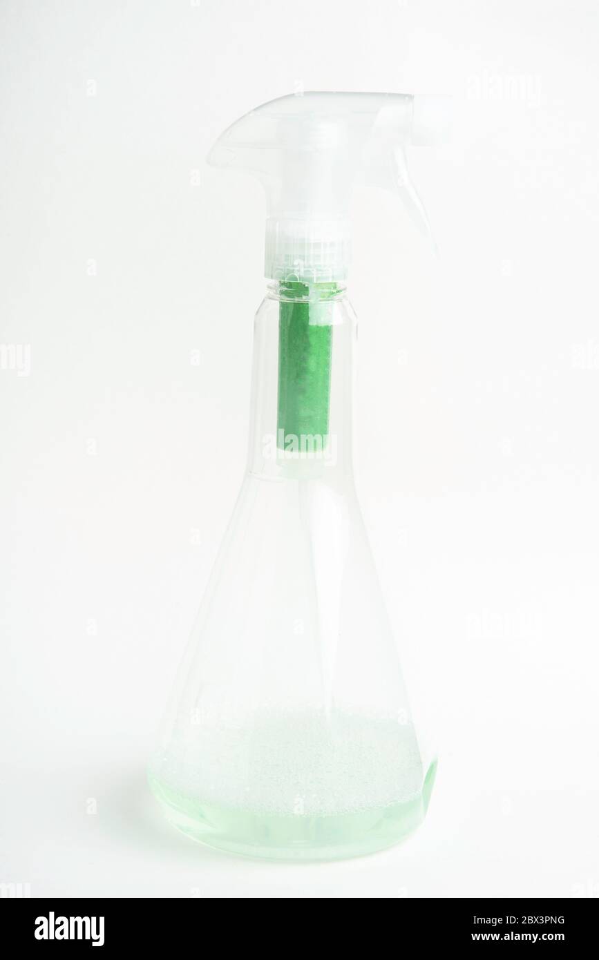 A product shot of the entire transparent liquid spray plastic dispenser ...