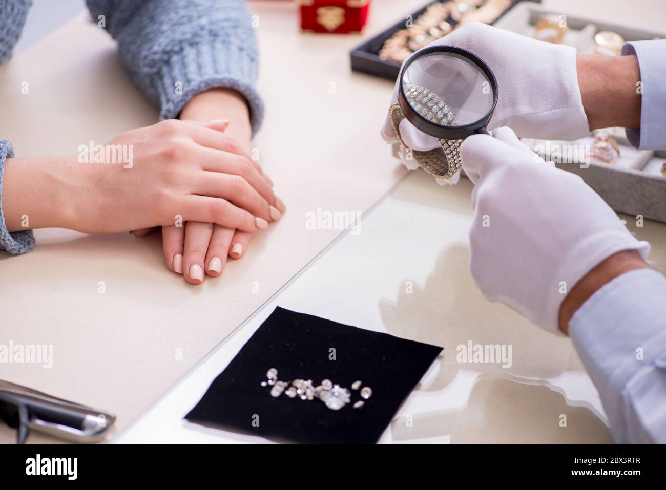 Examining diamonds hi-res stock photography and images - Alamy
