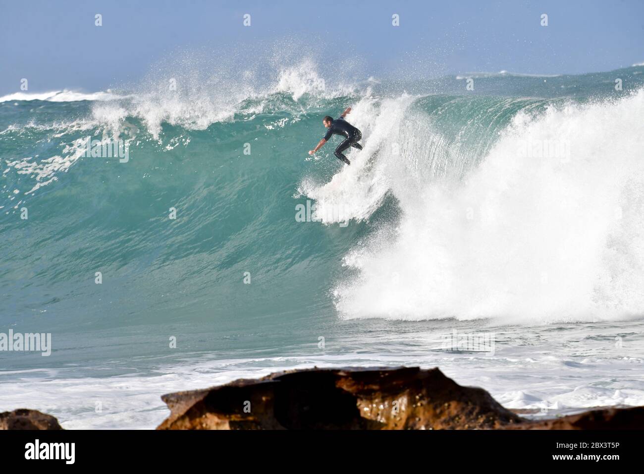 Surfers enjoy big surf conditions at Sydney's Dee Why Beach Stock Photo ...