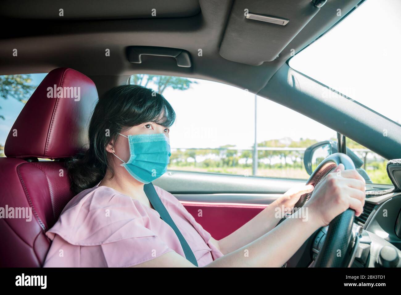 Asian woman driving car hi-res stock photography and images - Alamy