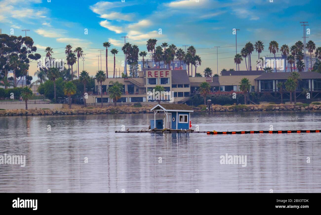 Reef Hotel Across Harbor Stock Photo - Alamy