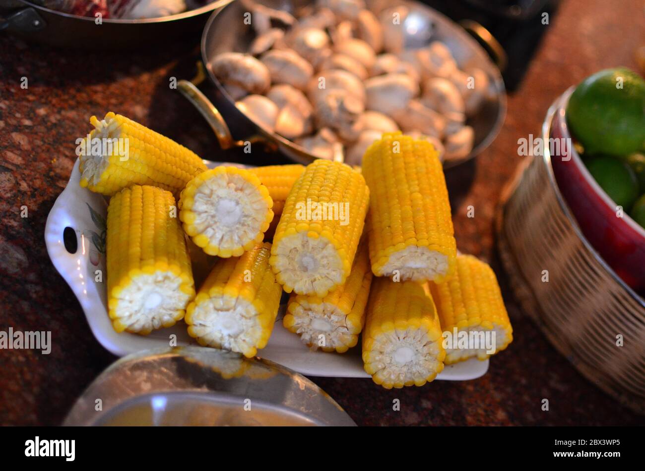 chunks of sweet corn cobs waiting for grill Stock Photo - Alamy