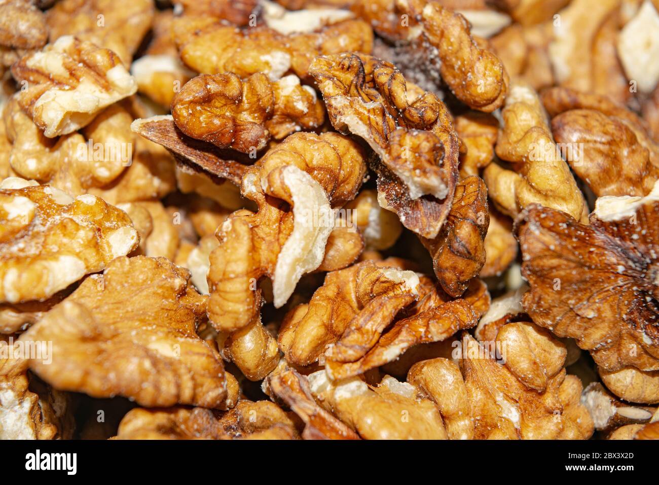 Peeled walnuts close-up. Surface texture. Healthy diet Stock Photo - Alamy