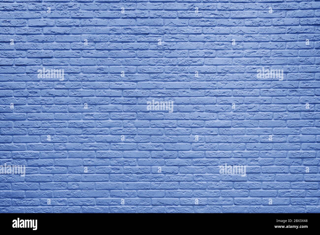 Blue brick wall background inside of the room Stock Photo - Alamy
