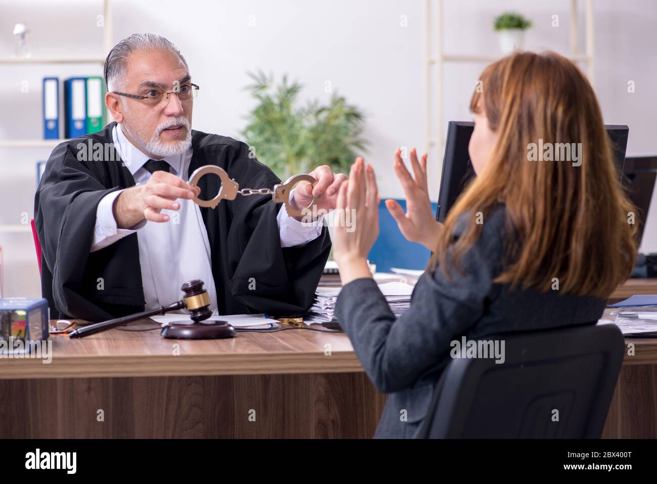 Female judge handcuffs hi-res stock photography and images - Alamy