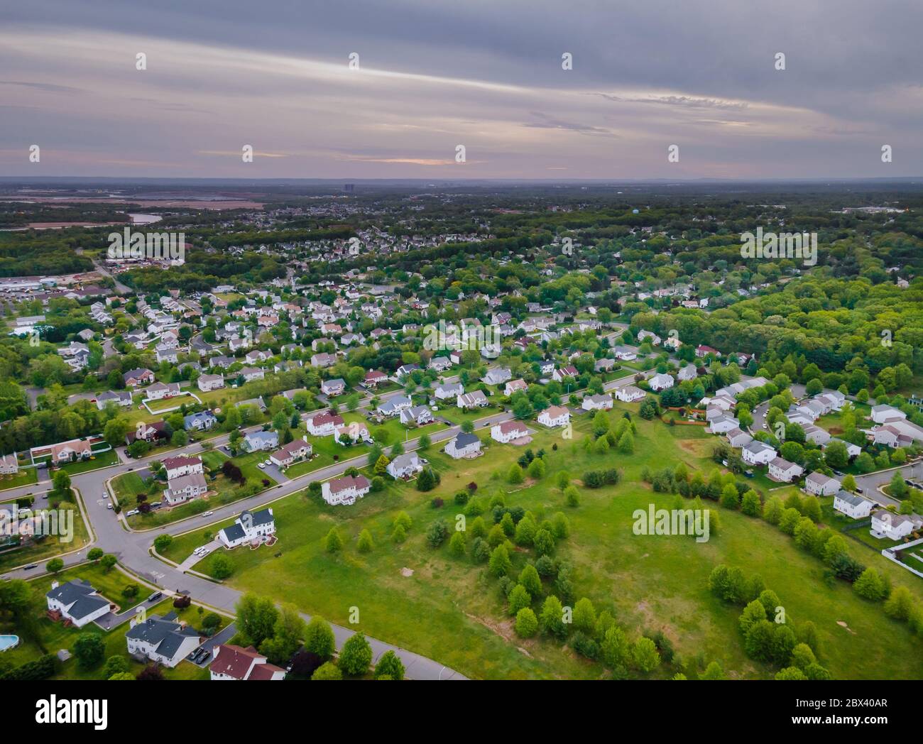 Aerial view of residential houses neighborhood and apartment complex ...
