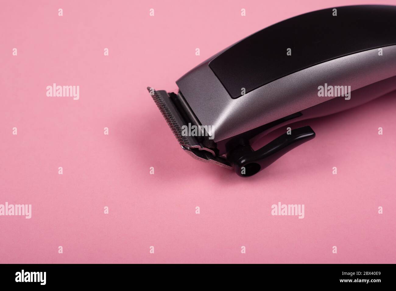 hair clipper close-up on a pink background. hairdresser's tool Stock ...