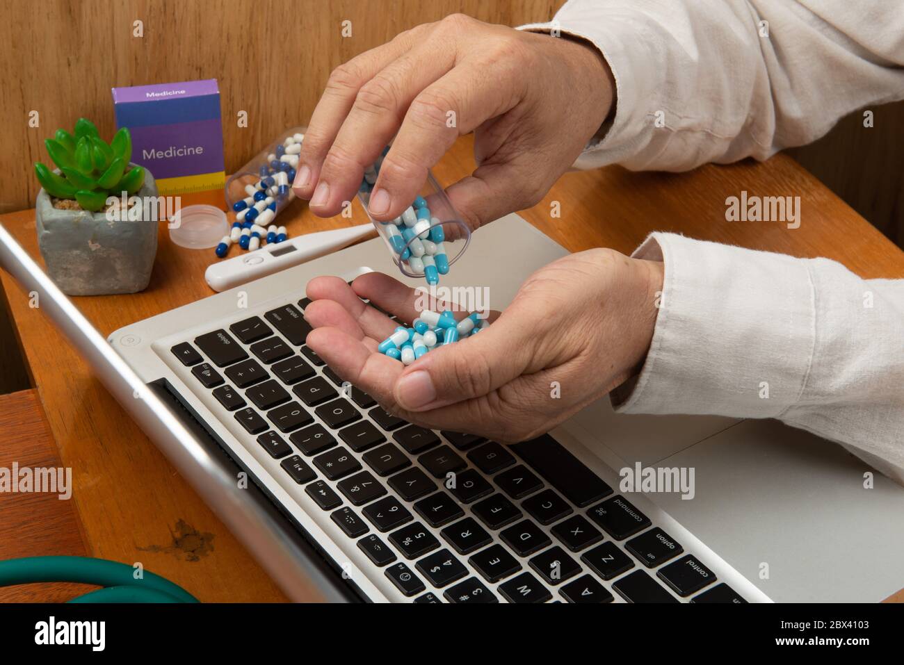 telemedicine - Doctor at the computer explains to the patient how to ...