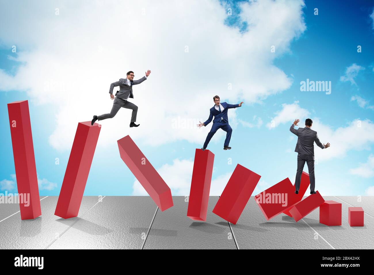 Business people in the collapsing economy concept Stock Photo - Alamy