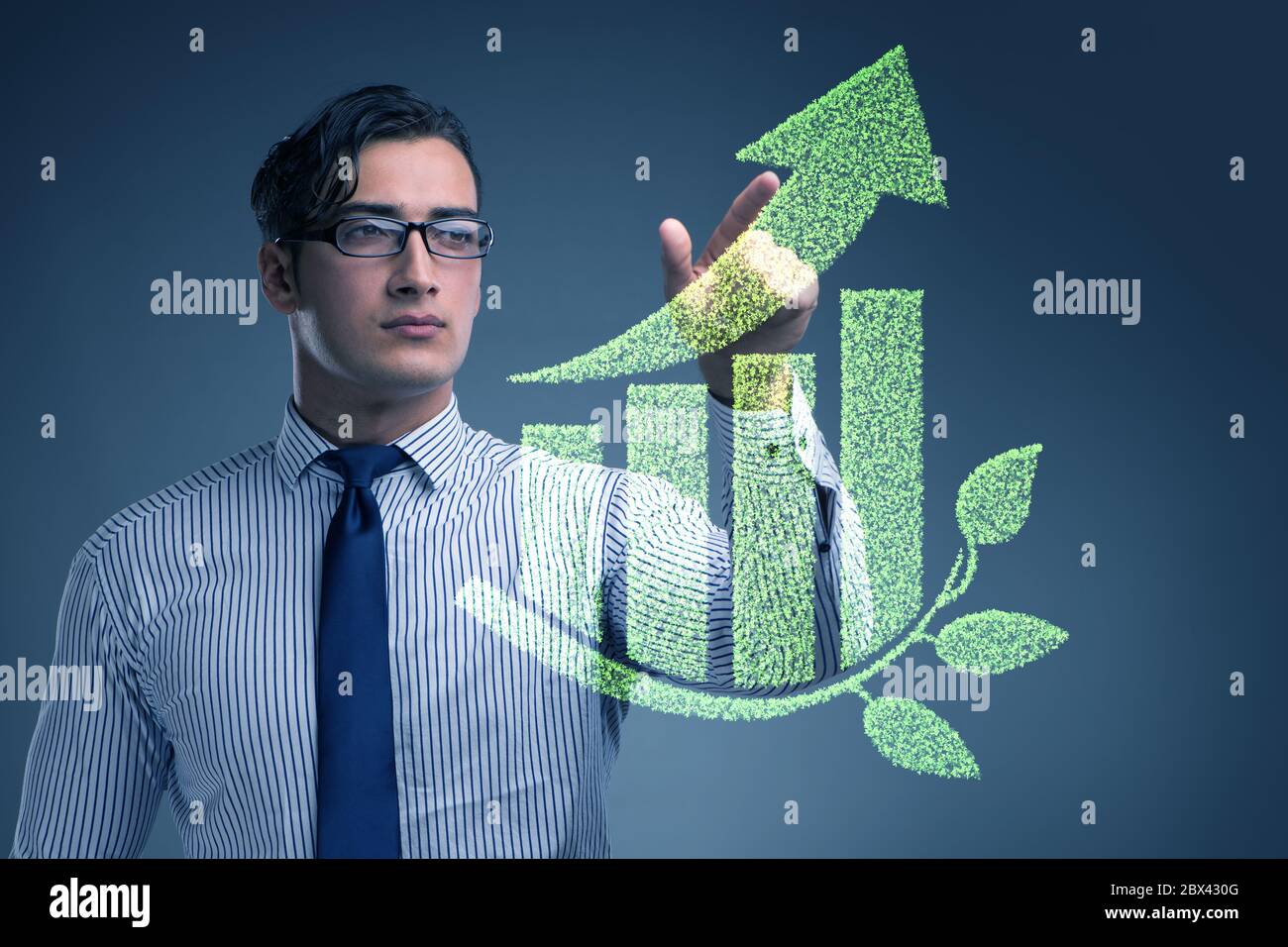Green economy growth concept with the businessman Stock Photo - Alamy