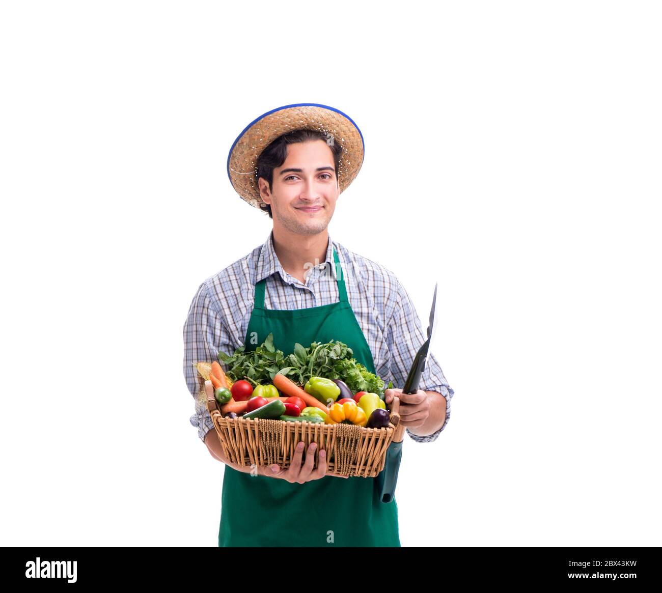 The young farmer with fresh produce isolated on white background Stock ...