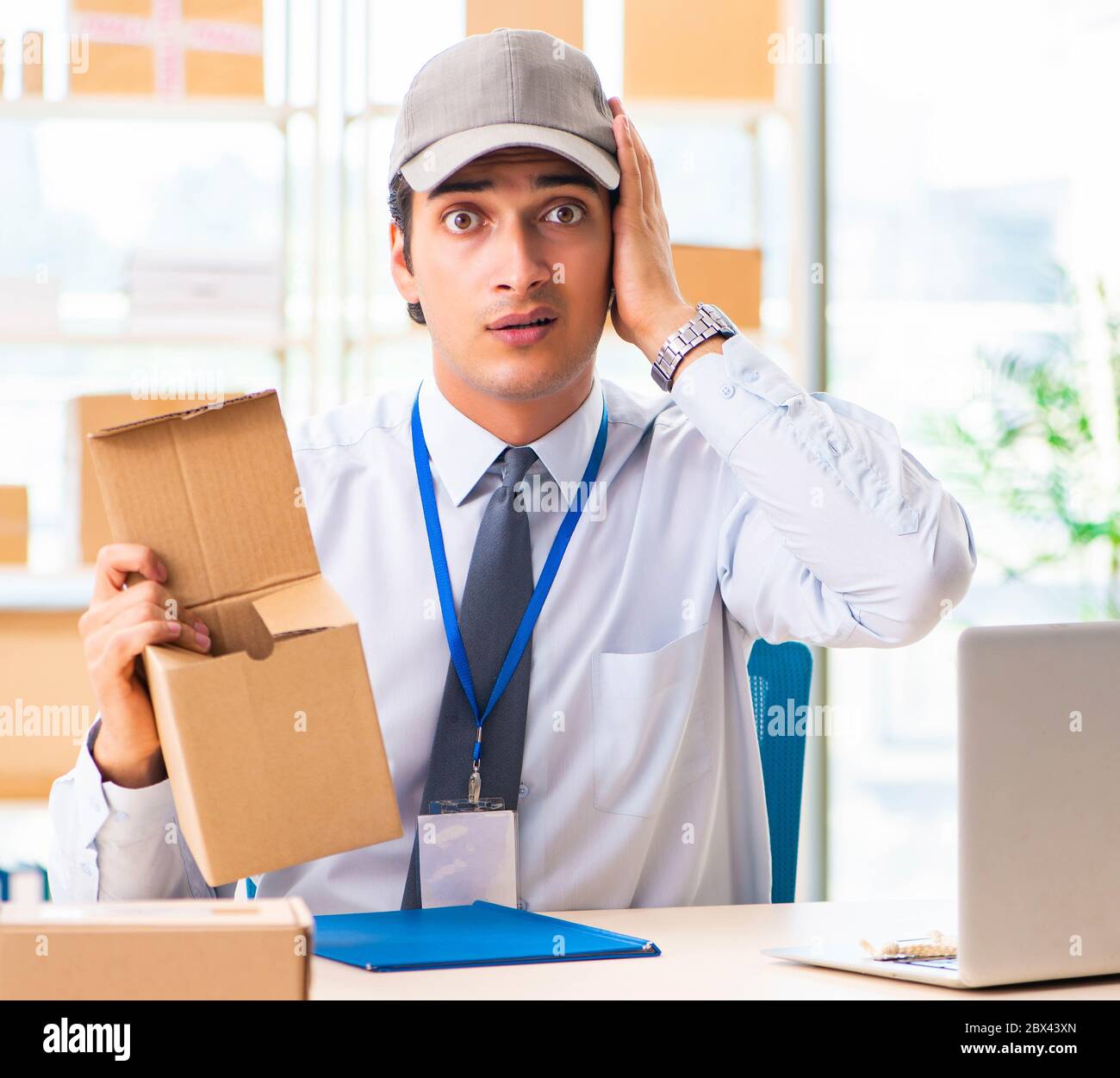 The male employee working in box delivery relocation service Stock ...