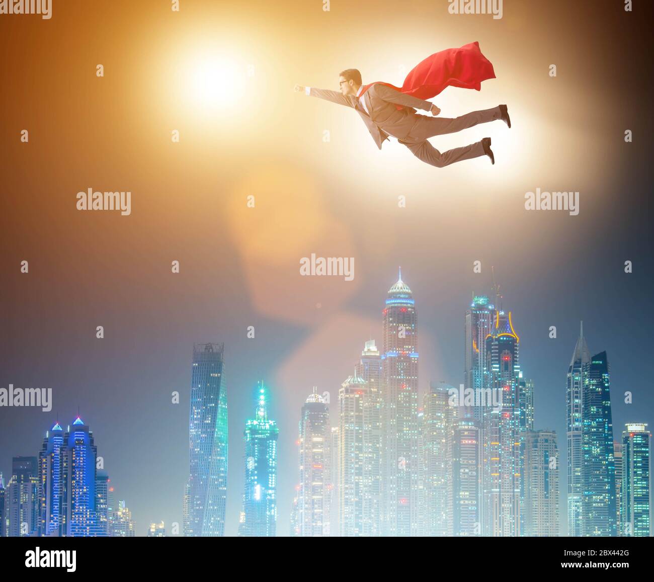 The superhero businessman flying over the city Stock Photo - Alamy