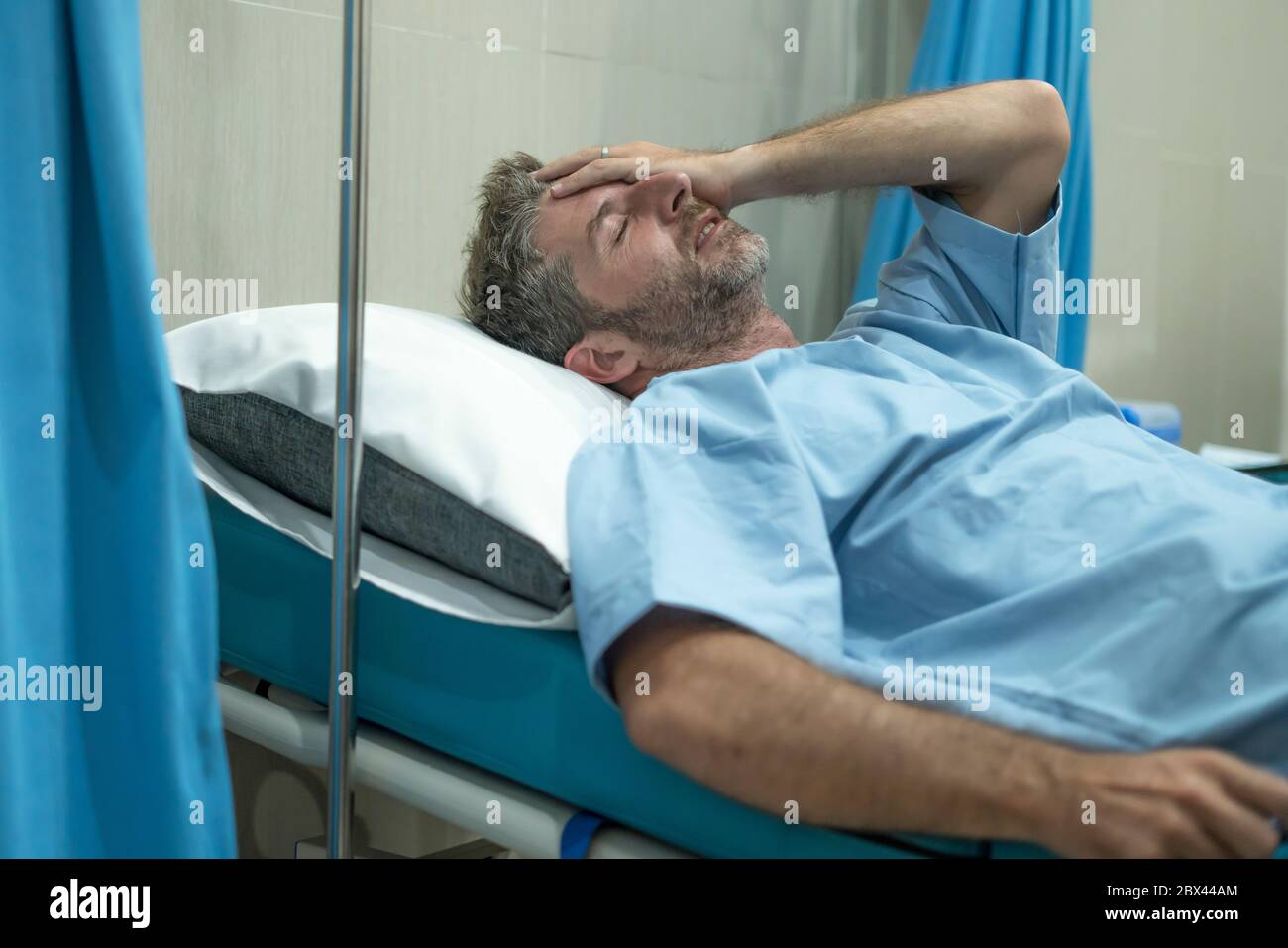 Hospital bed young man worried hi-res stock photography and images - Alamy