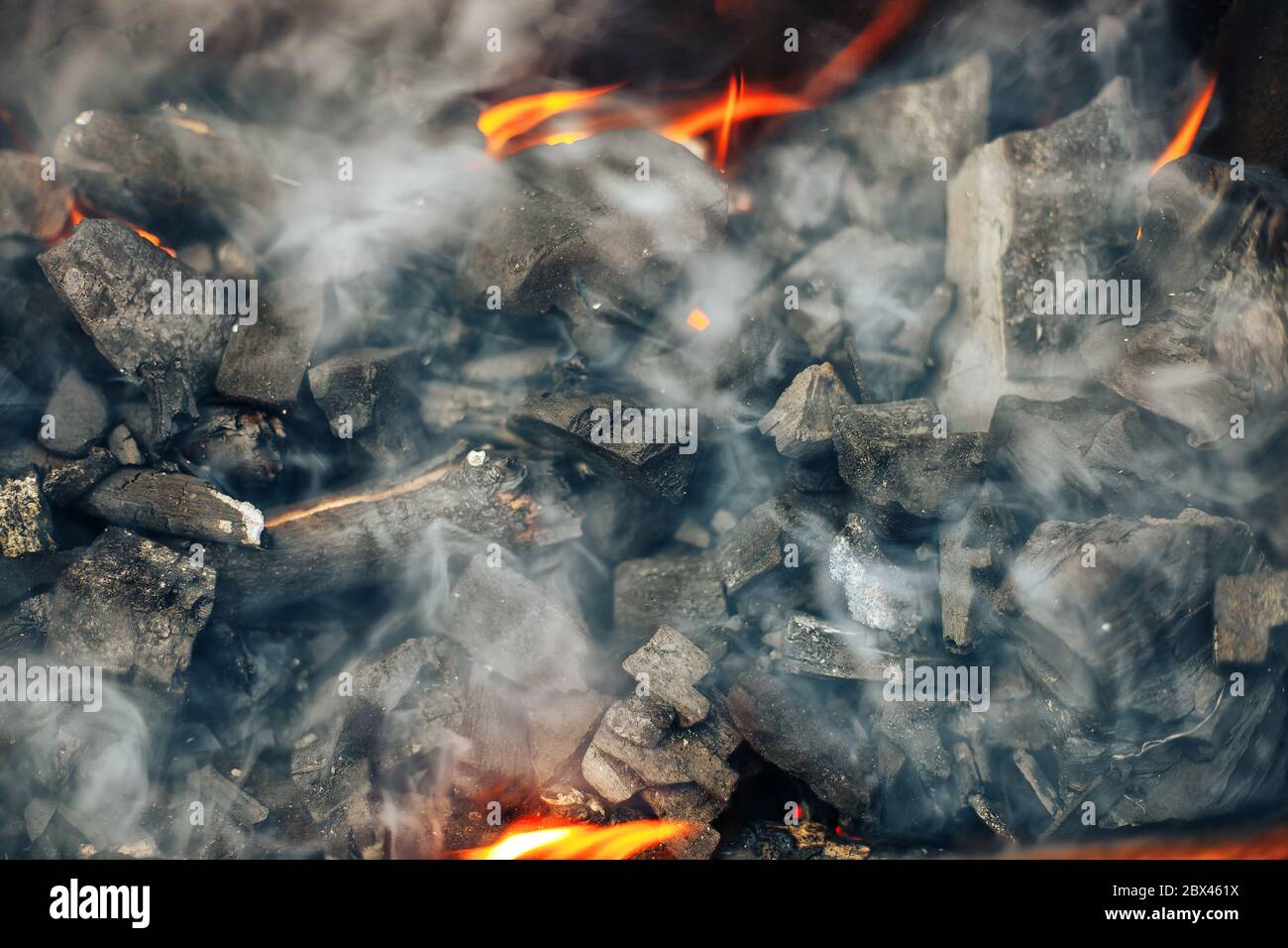 actively smoldering embers of fire coal barbeque Stock Photo - Alamy