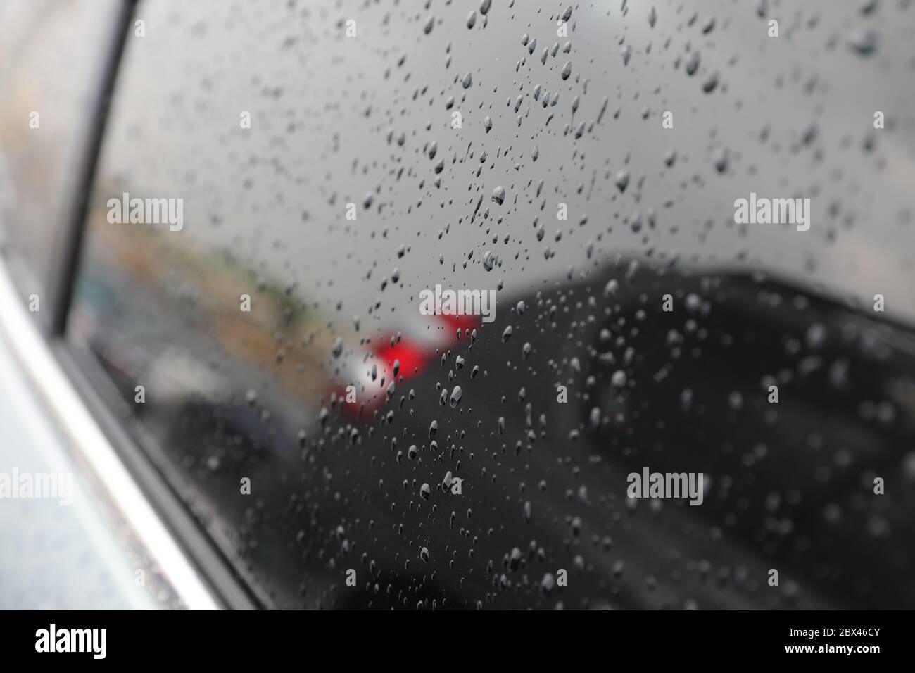 rain drops on car glass rainy day Stock Photo - Alamy