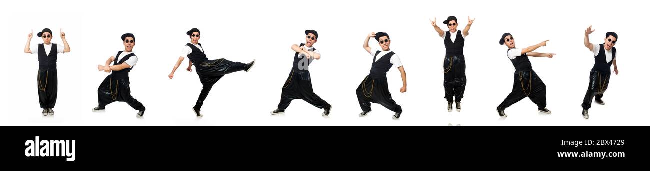 The funny young man dancing isolated on white Stock Photo - Alamy