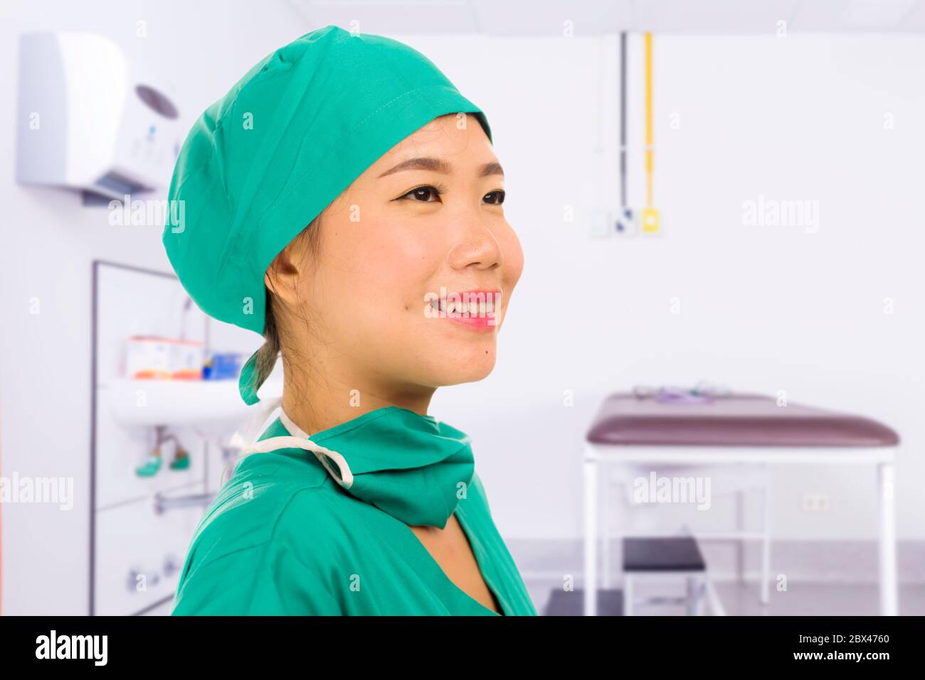 Asian Korean woman as successful physician - young beautiful and happy ...