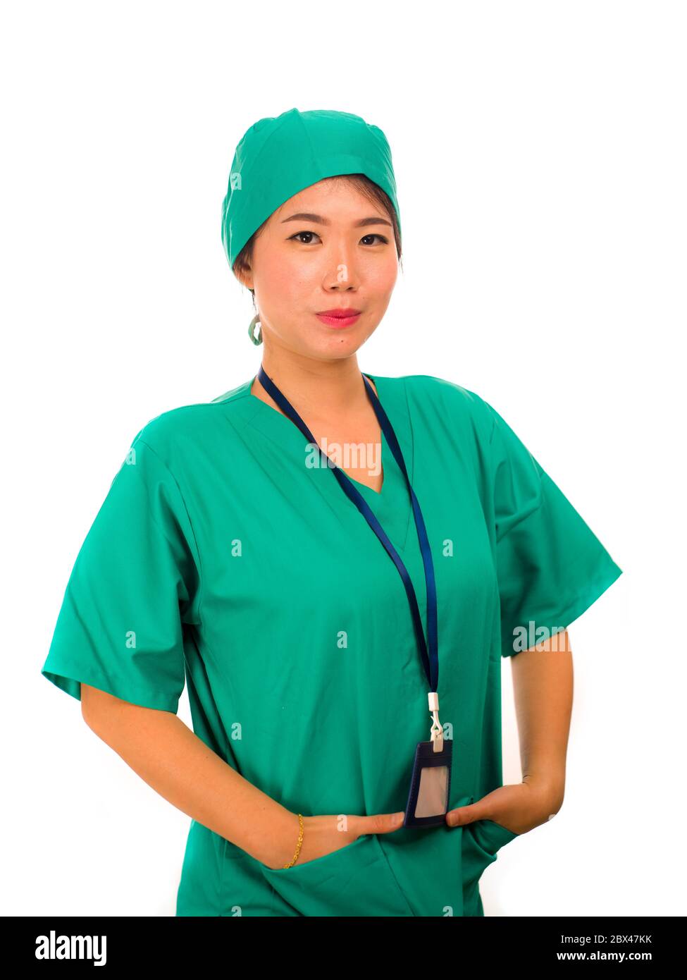 isolated portrait of young beautiful and happy Asian Chinese medicine ...