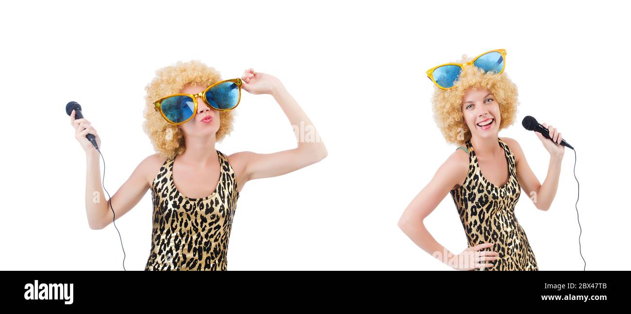 The funny singer woman with mic and sunglasses isolated on white Stock ...