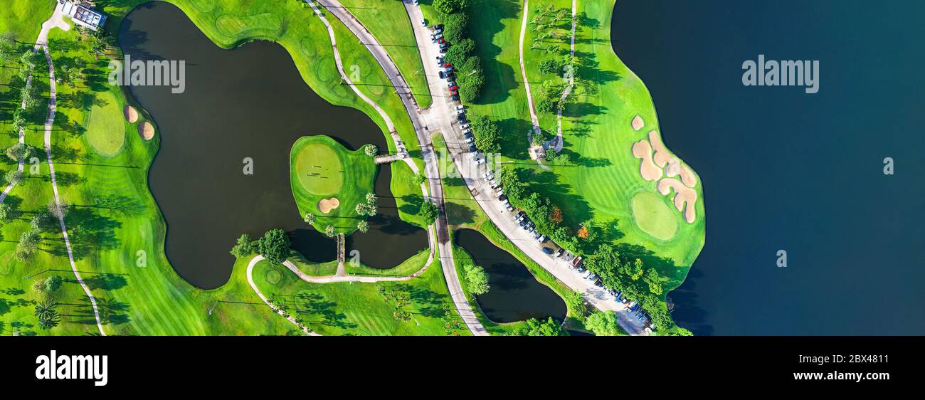 Aerial view of golf field landscape with sunrise view in the morning ...