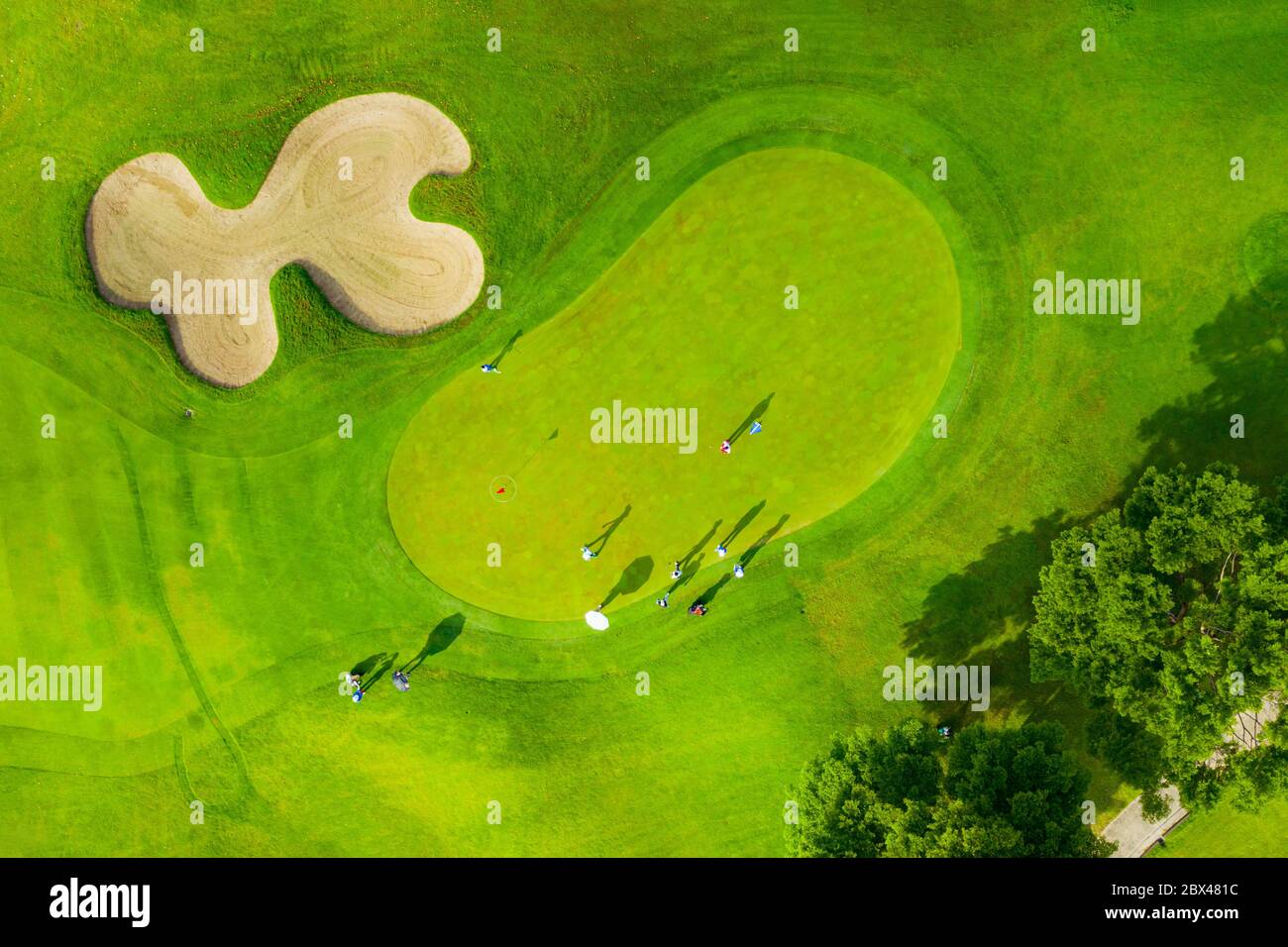 Aerial view of golf field landscape with sunrise view in the morning ...
