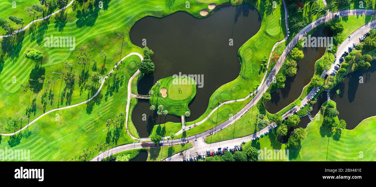 Aerial view of golf field landscape with sunrise view in the morning ...