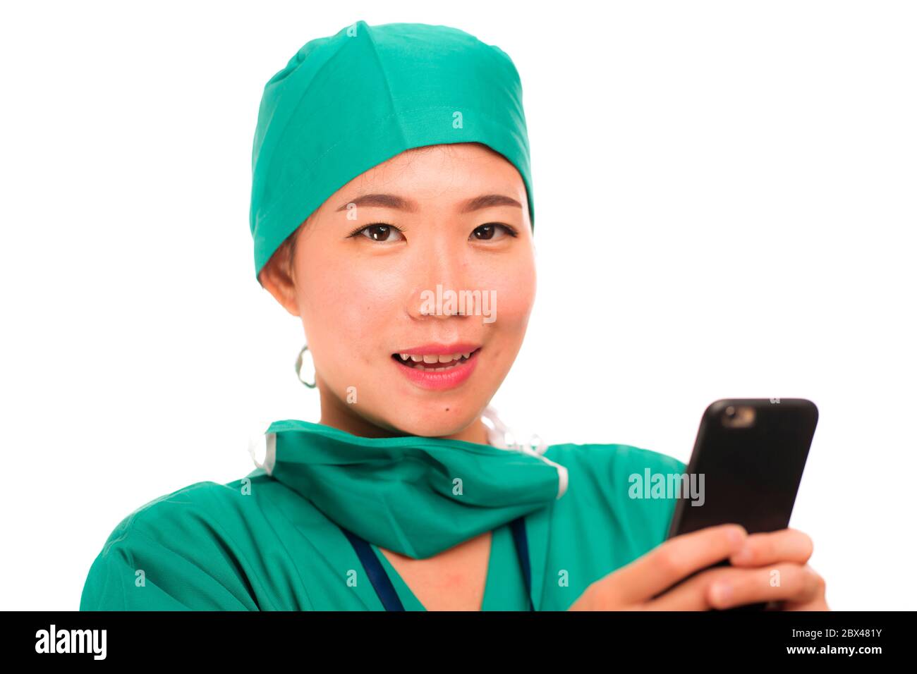 Asian Korean woman as successful physician using hand phone - young ...