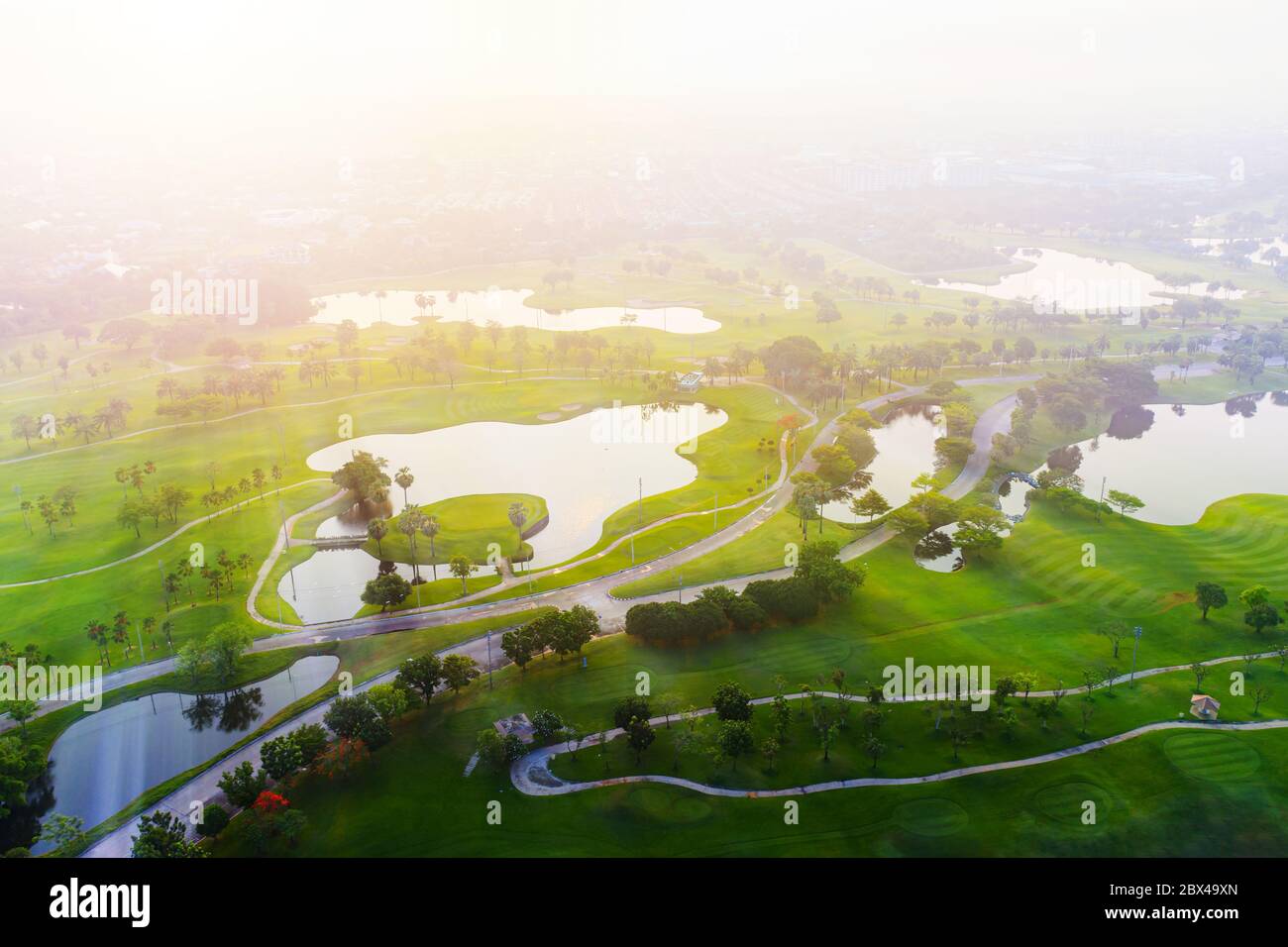 Aerial view of golf field landscape with sunrise view in the morning ...
