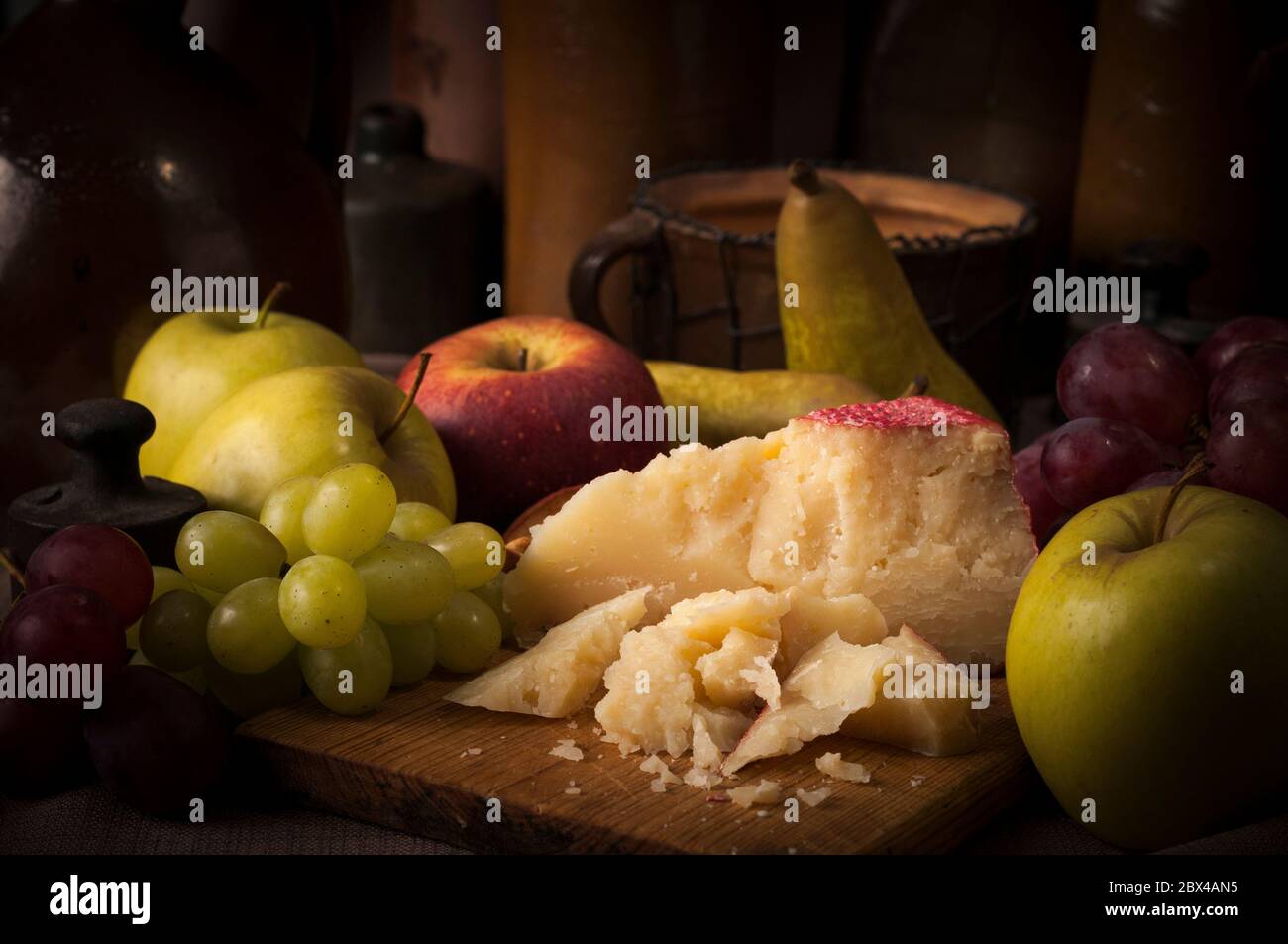 rustic corner still life with cheese Stock Photo - Alamy