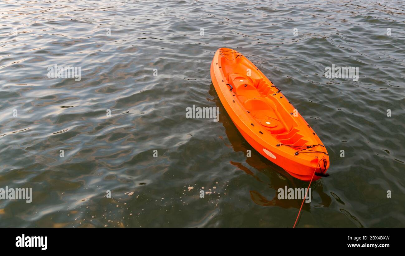 Orange kayak on the sea-Travel Concept Stock Photo - Alamy