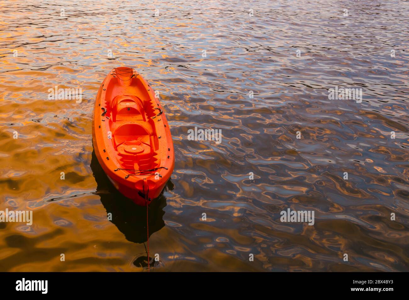 Orange kayak on the sea-Travel Concept Stock Photo - Alamy