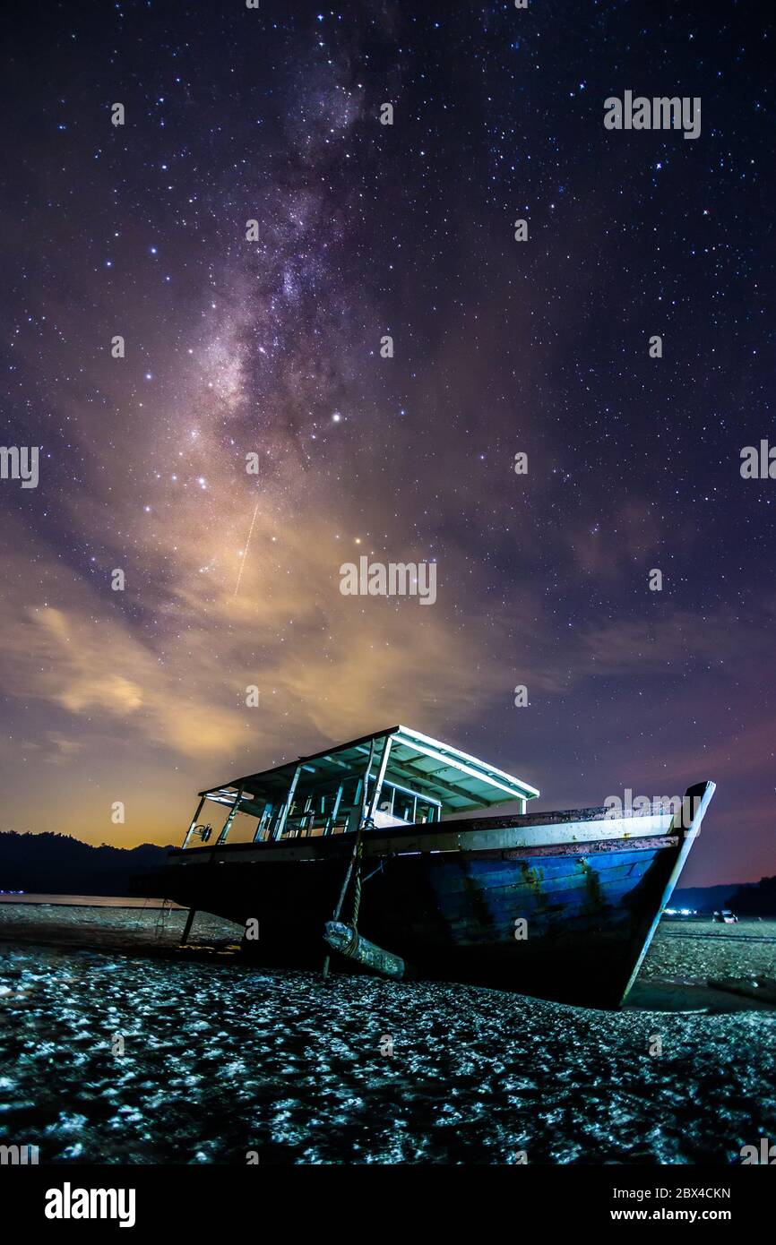 Amazing beautiful of night sky Milky Way Galaxy with abandon fisherman ...
