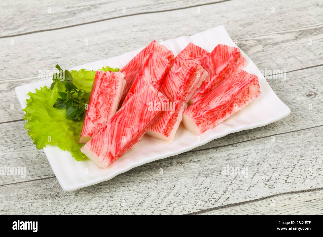 Crab surimi stick served salad leaves Stock Photo - Alamy