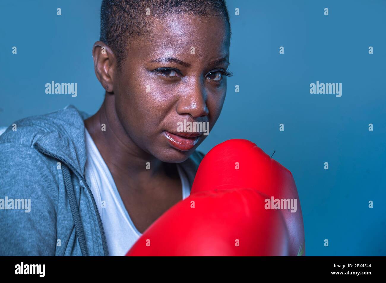close up face portrait of young angry and defiant black african ...