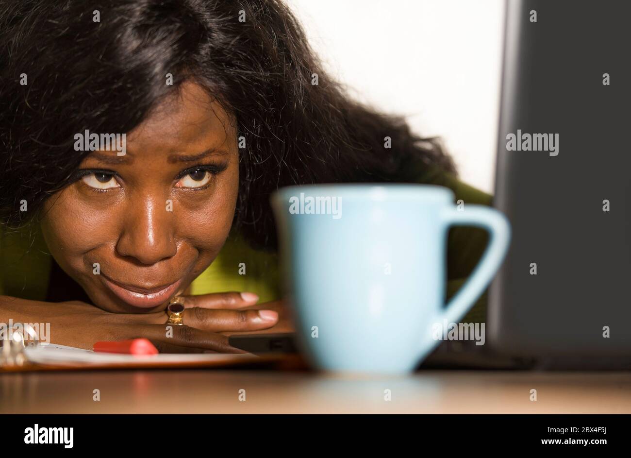 close up portrait of young sad and depressed black afro American ...