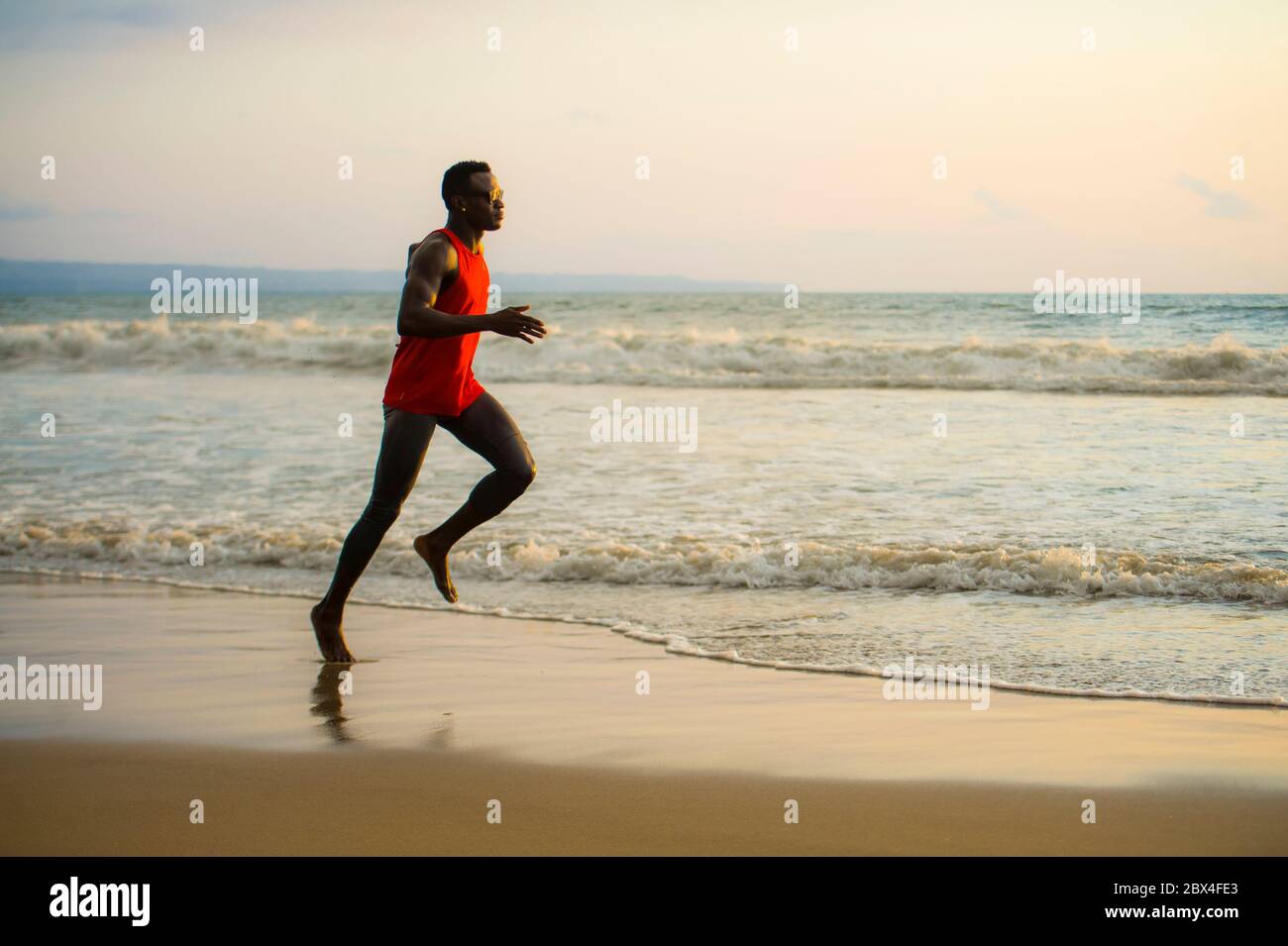 young attractive fit athletic and strong black African American man ...